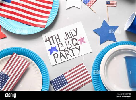 Card With Text 4th July Bbq Party Dinnerware And Usa Flags For