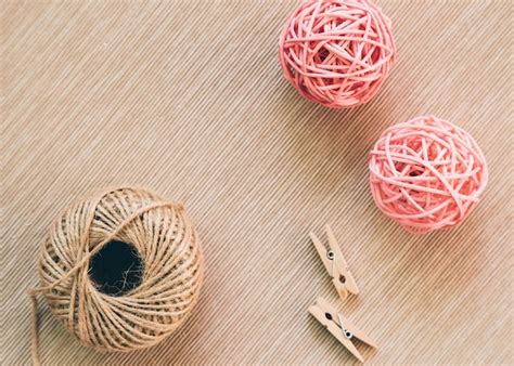 Premium Photo Close Up Of String Spools On Table