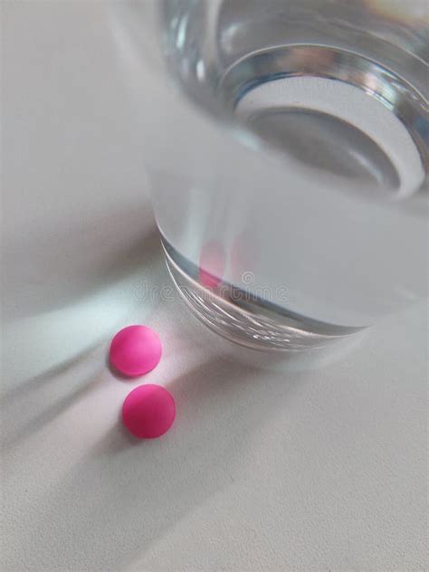 Pink Medicine And Glass Of Water Stock Image Image Of Pink Illness 293023113