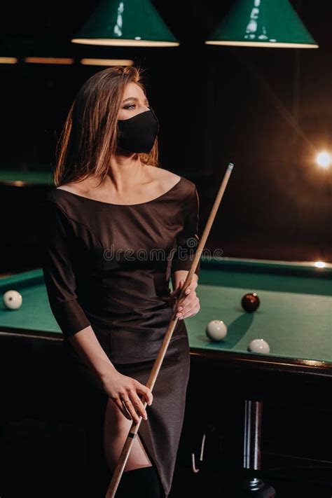 Masked Girl In A Pool Club With A Cue In Her Hands Stock Image Image