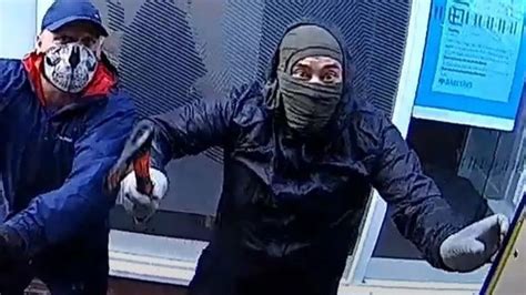 Police Searching For Axe Wielding Man After Attempted Bank Robbery In