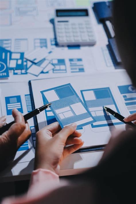 Young Asian Business Creative Team Work Together Mobile Application Software Design Project