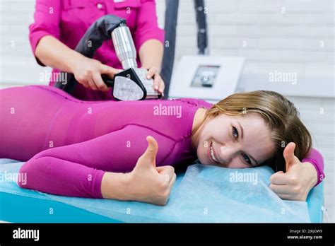 Cosmetologist Doing Anticellulite Lpg Massage For Woman In Pink Lpg