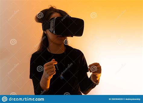 Amazed Teen Girl Wear Vr Glasses Using Technology For Education In