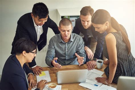 Evaluating The Pros And Cons Of His Concept A Group Of Coworkers