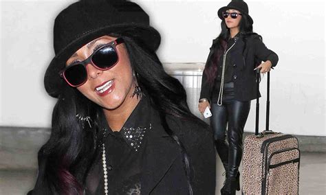 Snooki Exposes Her Leopard Print Bra In A Sheer Blouse Paired With
