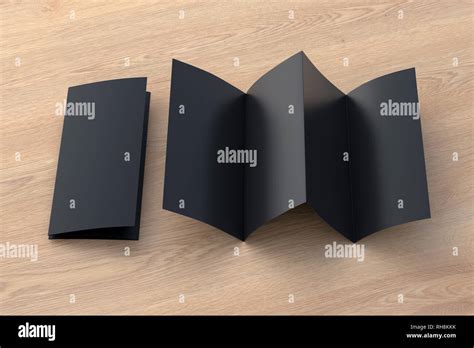Blank Black Folded Paper Leaflet On Wooden Background Eight Pages