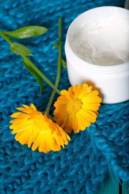 Premium Photo | Face cream with calendula extract. closeup