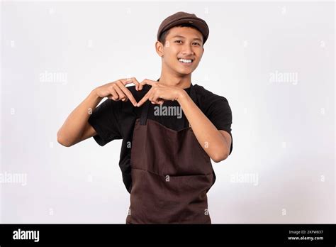 Handsome Barista Asian Man Wearing Brown Apron And Black T Shirt