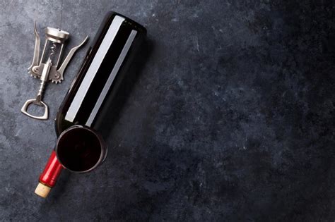 Premium Photo Red Wine Glass And Bottle