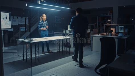 In The Dark Industrial Design Engineering Facility Male And Female