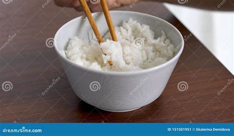 Closeup Of Woman Eating Rice From Bowl Stock Image Image Of Plate