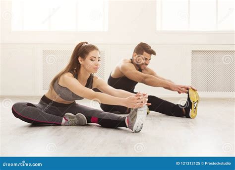 Fitness Couple At Stretching Training Indoors Stock Image Image Of
