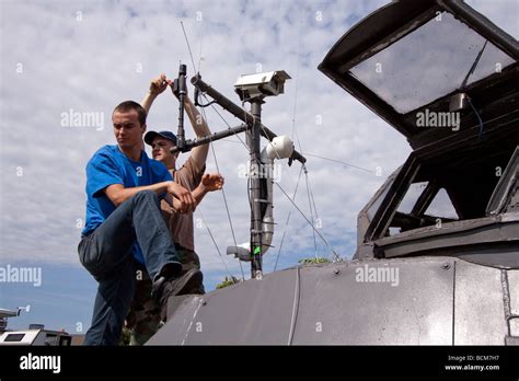 Members Of Project Vortex 2 Attach Weather Instrumentation To The