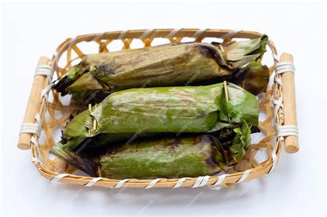 Premium Photo Grilled Sticky Rice In Banana Leaves With Banana Filling
