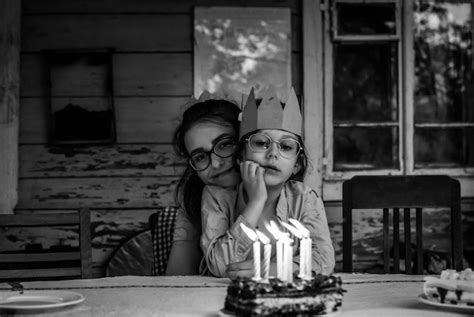 Premium Photo Portrait Of Sibling On Table Against The Birthday Cake