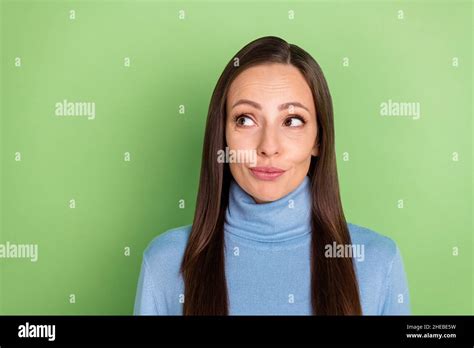 Photo Of Curious Dreamy Inspired Pretty Lady Look Empty Space Wear Blue