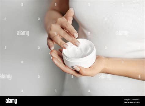 Closeup Of Female Hands Applying Hand Cream Lotion Hand Skin Care