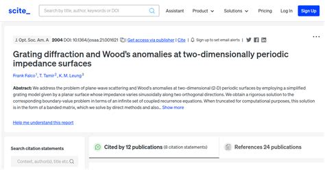 Grating Diffraction And Woods Anomalies At Two Dimensionally Periodic Impedance Surfaces