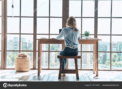 Rear View Woman Using Computer While Working Creative Office Stock Photo By Gstockstudio 197173292