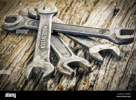 Rusty Vintage Metallic Spanners On Wooden Table Stock Photo Alamy