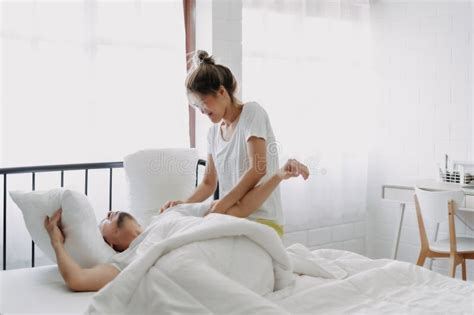 Funny Lovely Couple Wife Trying To Wake Husband Up In The Morning