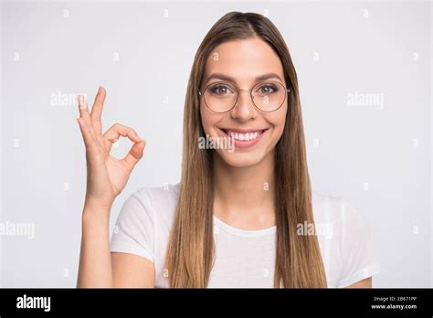 Closeup Photo Of Pretty Lady Showing Okey Symbol Wear Specs And T Shirt