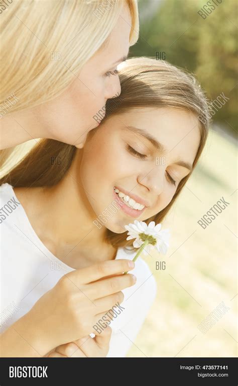 Mother Kisses Daughter Image And Photo Free Trial Bigstock