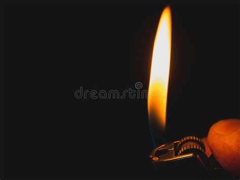 The Lighter Produces A Spark Creating Fire Symbol Of Danger