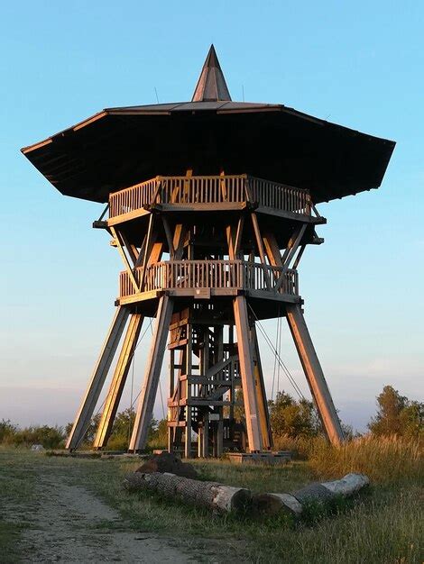 Premium Photo Built Structure On Field Against Sky