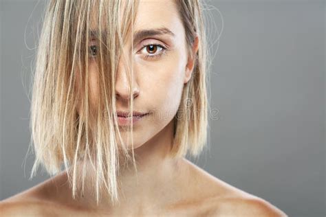 Beautiful Girl Fashion Portrait With Windy Hair Looking At Camera