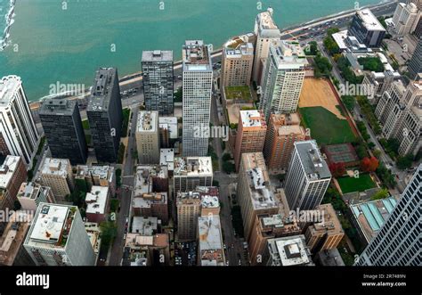 Aerial View Of Chicago Downtown With High Rise Buildings And Lake