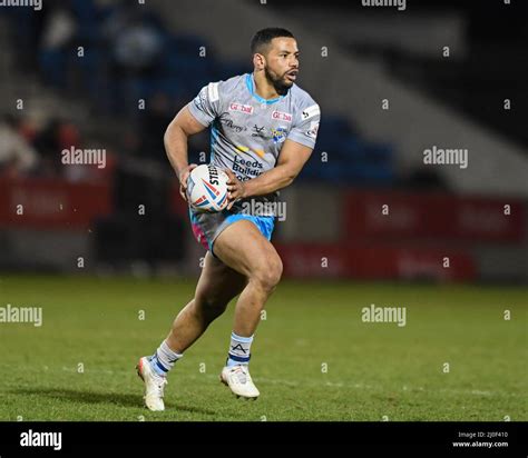 Kruise Leeming 9 Of Leeds Rhinos Runs Forward With The Ball Stock