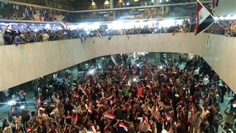 Iraq Protesters Breach Baghdads Green Zone Storm Parliament Cbs News