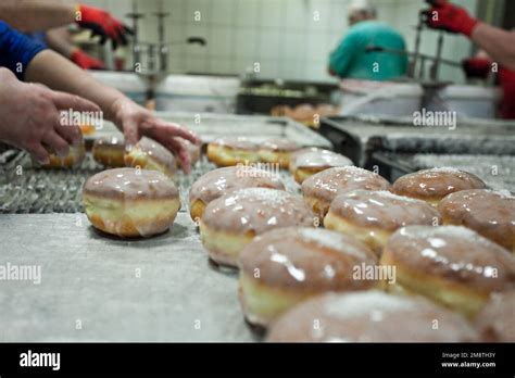 Baking Donuts In A Pastry Shop Traditional Polish Fat Thursday Donut