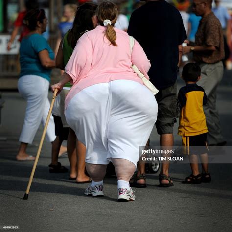 Topshot An Overweight Woman Walks At The 61st Montgomery County