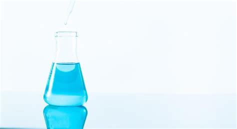 Premium Photo Blue Science Experiment Flask On White Background