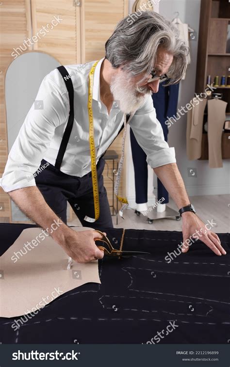 Professional Tailor Cutting Fabric By Following Stock Photo Shutterstock