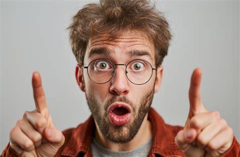 Premium Photo Man Surprised With Glasses Pointing At Camera