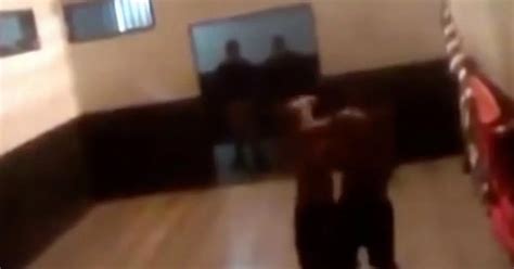 Prison Guards Watch As Two Inmates Trade Brutal Blows During Shocking