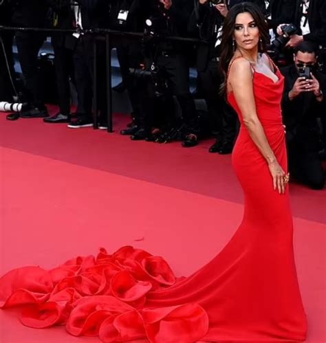 Eva Longoria Shows Off Her Leggy Figure In A Plunging Black Mini Dress As She Leads The Stars At