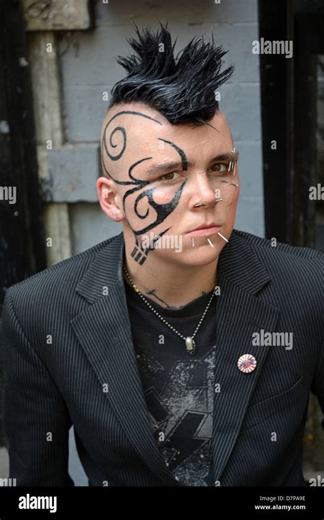Portrait Of A Gender Ambiguous Person In Greenwich Village With A Stock