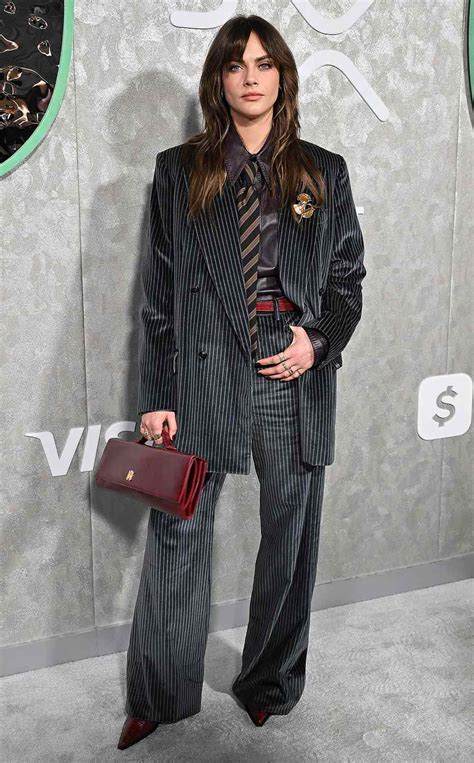 Cara Delevingne Turns To The Dark Side With New Shaggy Brunette Hairstyle
