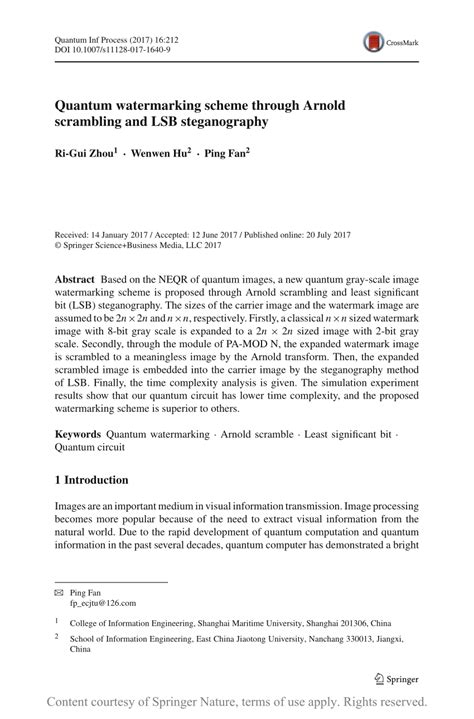 quantum watermarking scheme through arnold scrambling and lsb