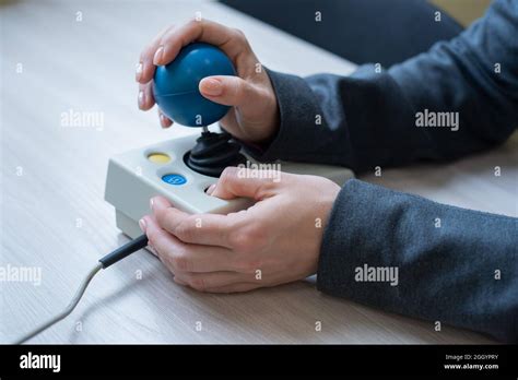 Woman With Cerebral Palsy Works On A Specialized Computer Mouse Stock Photo Alamy