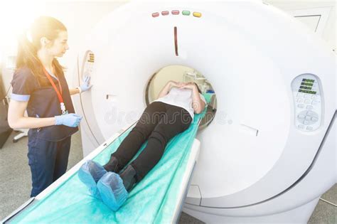 Radiologist With A Female Patient In The Room Of Computed Tomography Stock Image Image Of