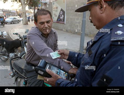 Traffic Police Sergeant Issuing E Challan To Motorist Violet Traffic