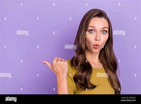 Profile Photo Of Impressed Lady Pouted Lips Indicate Thumb Empty Space