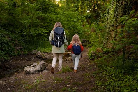 Free Photo Full Shot Woman And Girl Exploring Nature