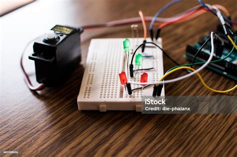 Breadboard With Led Photoresistor Resistance And Servomotor Connected